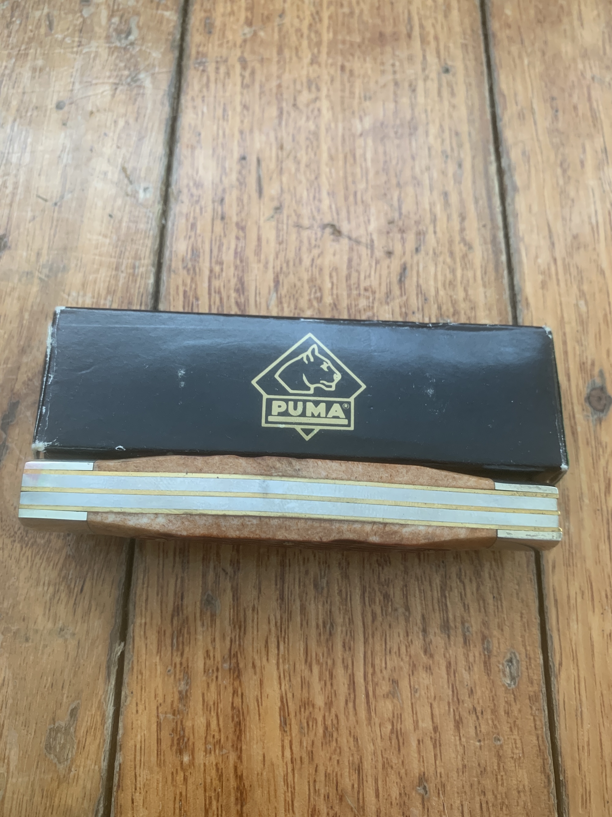 Puma Knife: Puma Stockman Folding Knife with Jigged Red/Brown Bone Handle