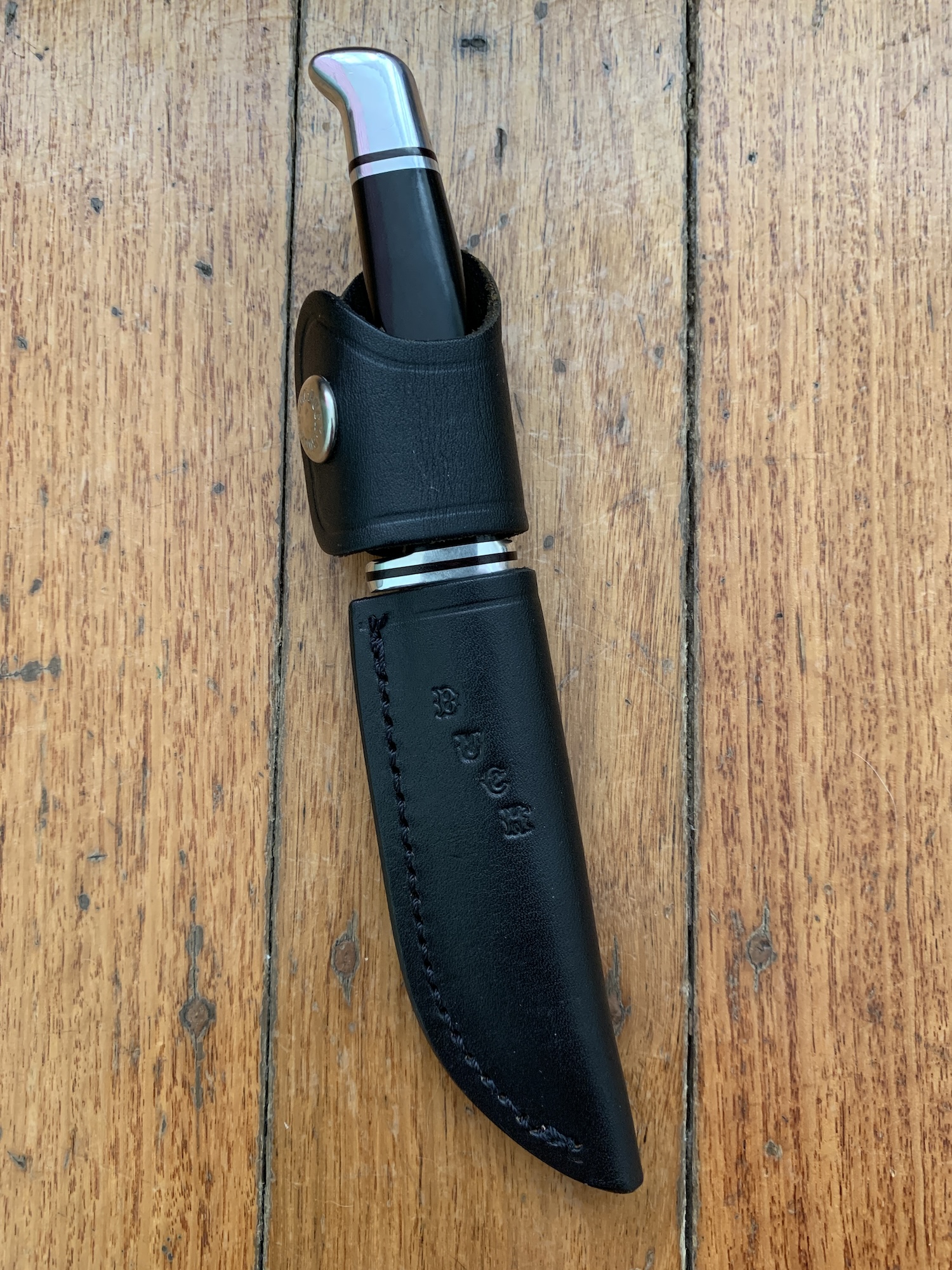Buck Knife: Buck 1995 Woodsman 102 with Black Phenolic Handle & Leather ...