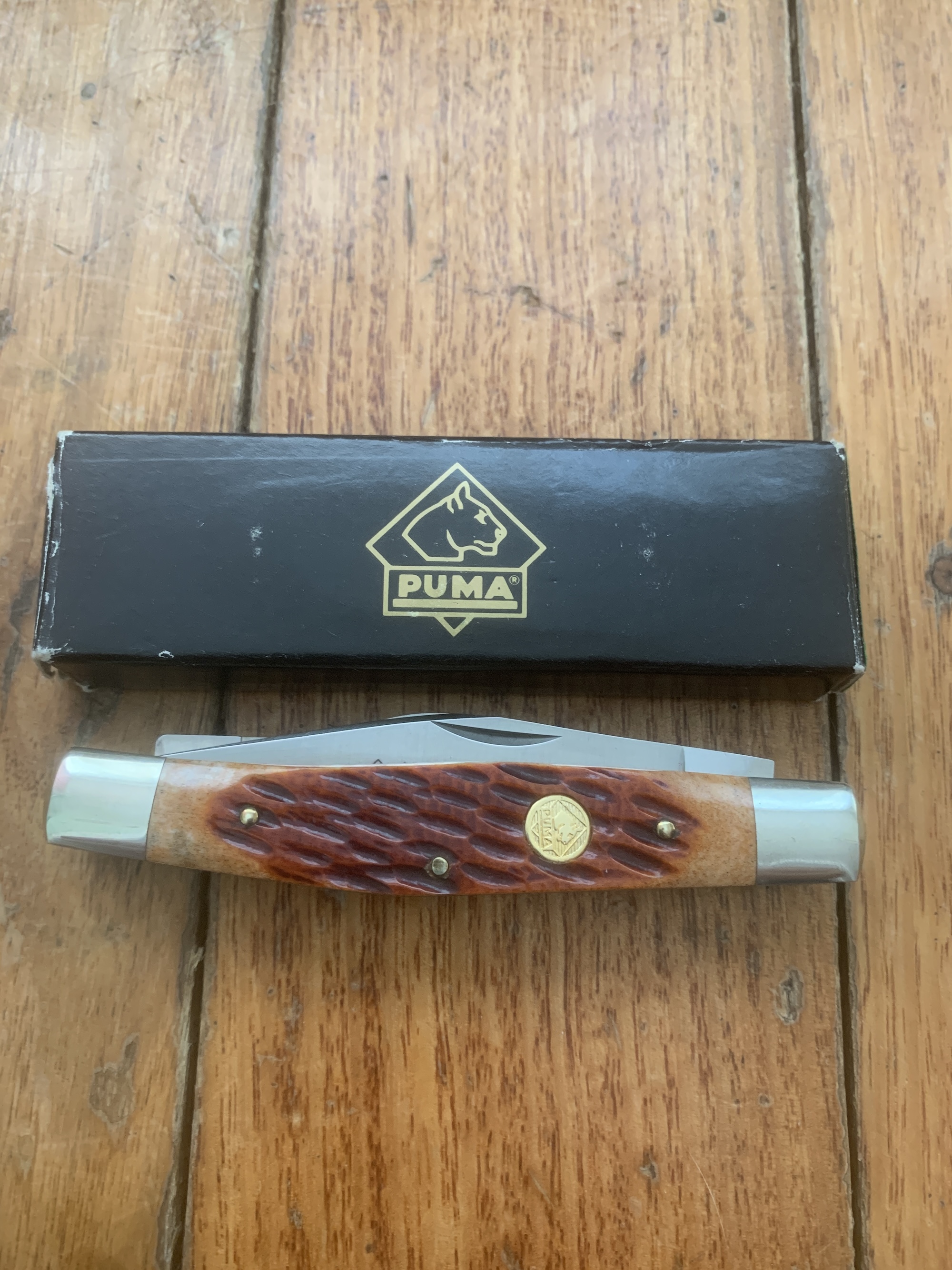 Puma Knife: Puma Stockman Folding Knife with Jigged Red/Brown Bone Handle