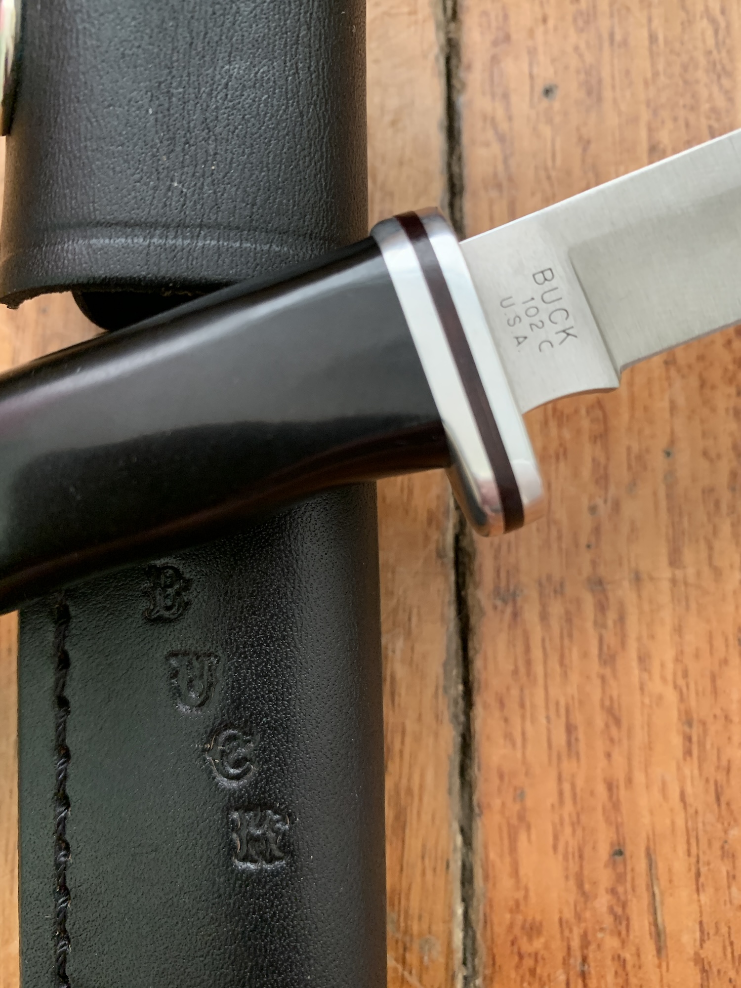 Buck Knife: Buck 1995 Woodsman 102 with Black Phenolic Handle & Leather ...