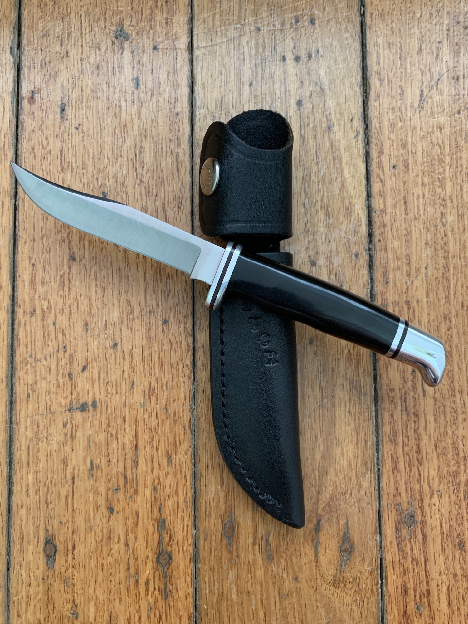 Buck Knife: Buck 1995 Woodsman 102 with Black Phenolic Handle & Leather ...