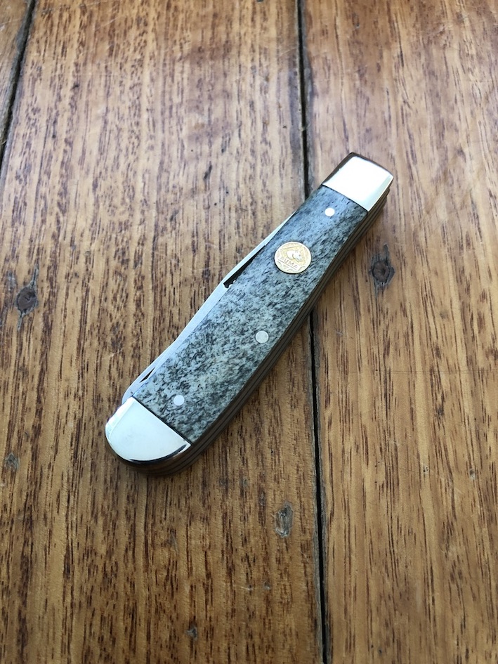 Puma Knife: Puma Trapper Lockback Knife with Green Smooth Bone Handle