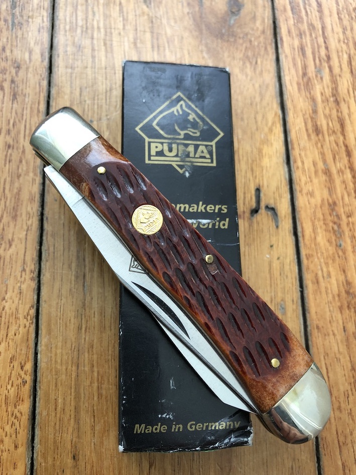 Puma Knife: Puma Large Trapper Lockback Knife with Jigged Red Bone Handle