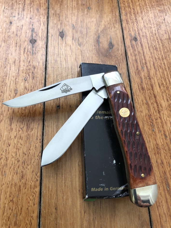 Puma Knife: Puma Large Trapper Lockback Knife with Jigged Red Bone Handle