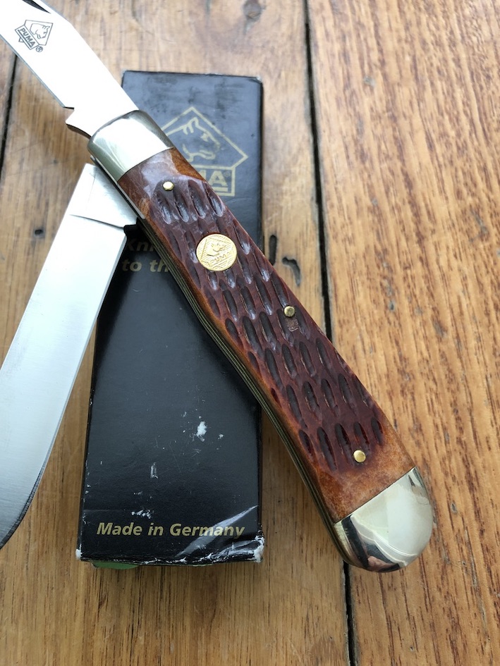 Puma Knife: Puma Large Trapper Lockback Knife with Jigged Red Bone Handle