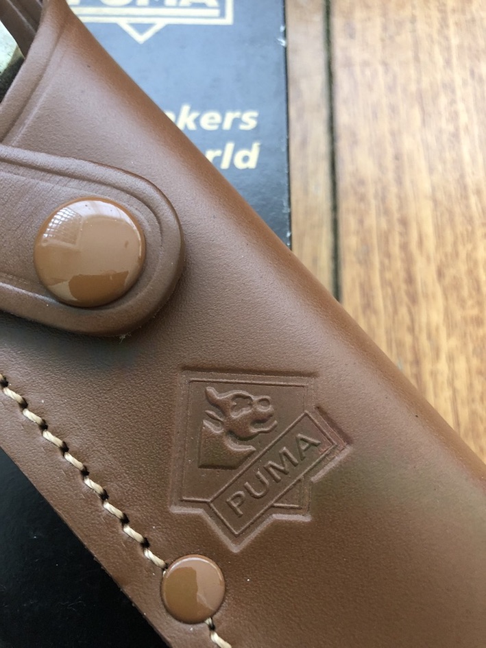 Puma Knife: Puma Skinner II Laser Cut with Stag Handle and leather sheath