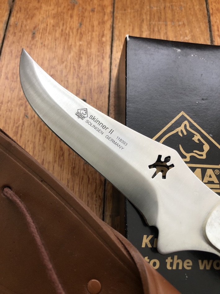 Puma Knife: Puma Skinner II Laser Cut with Stag Handle and leather sheath