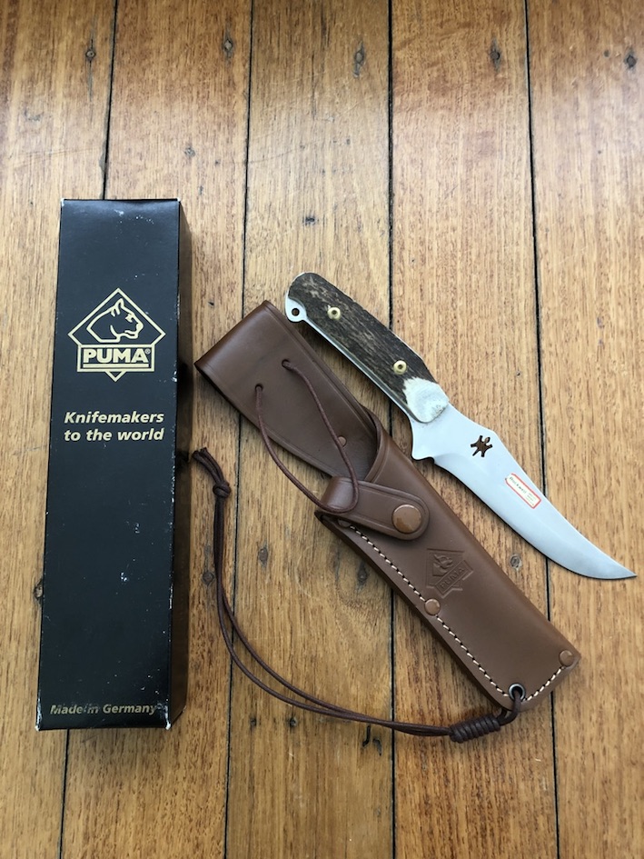 Puma Knife: Puma Skinner II Laser Cut with Stag Handle and leather sheath