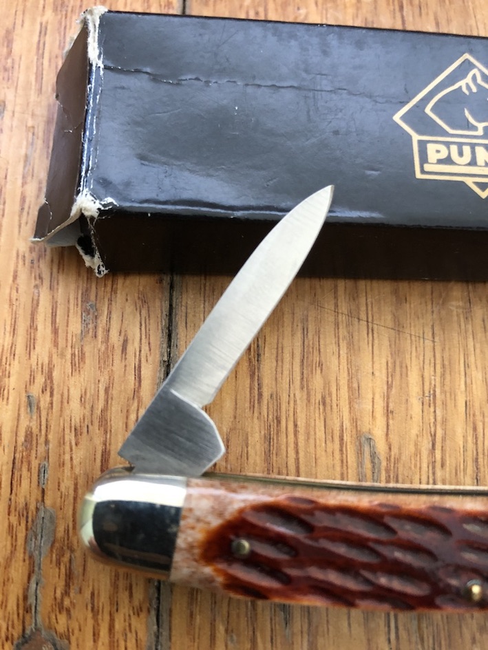 Puma Knife: Puma Bantam Folding Knife with Red Bone Handle Circa early 2000