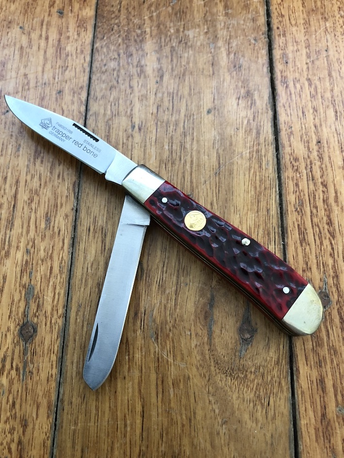 Puma Knife: Puma Trapper Lockback Knife with Jigged Red Bone Handle